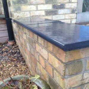 Black Limestone Wall Coping - Paving - Mick George